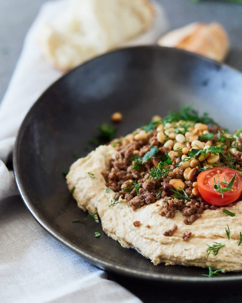 Spiced Ground Beef Topped on Hummus - Delice Recipes