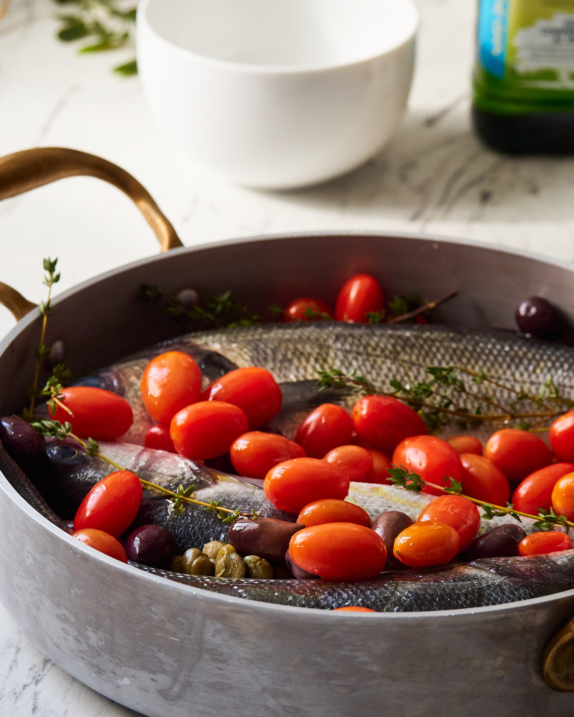 Greek-style Poached Sea Bass Recipe [Video] - Delice Recipes